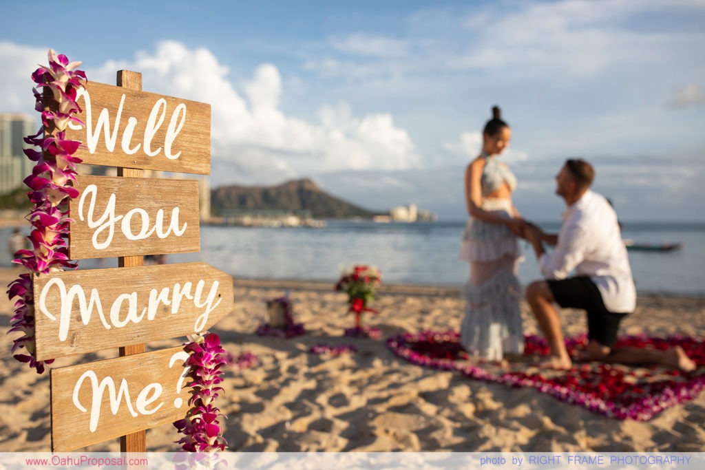 Sunset Proposal at Waikiki Beach with a rose petal heart in the sand
